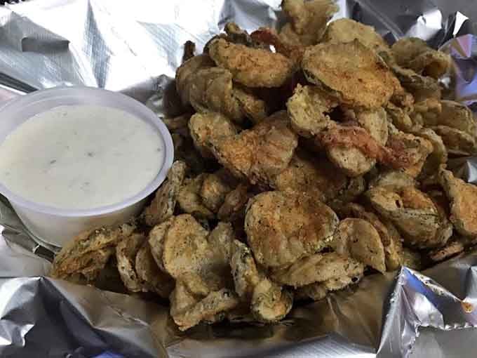 Crispy fried pickles with cool ranch dressing make the perfect sidekick to any main course you choose.