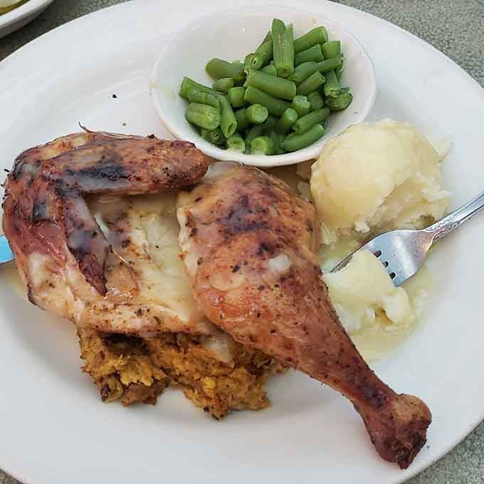 Perfectly roasted chicken with mashed potatoes and green beans proves this place doesn't quit after the breakfast rush ends.