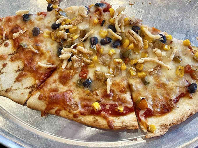 Pizza that proves vegetables can be exciting, loaded with enough toppings to make every slice an adventure.