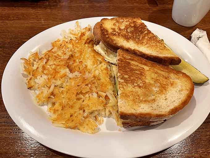 Crispy hash browns and golden toast prove that sometimes the simplest combinations create the most satisfying breakfast memories.
