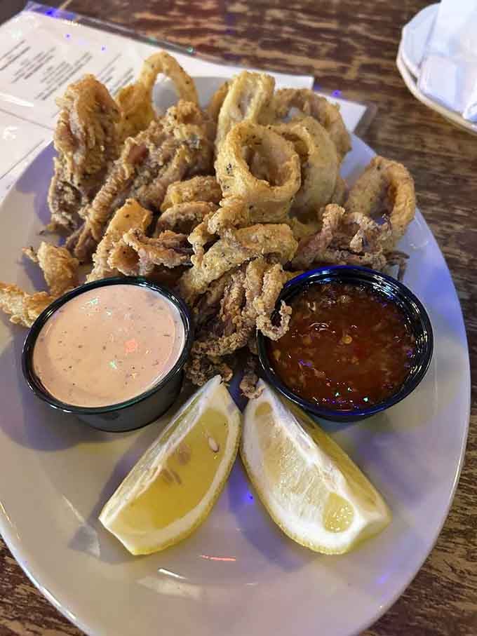 Golden calamari rings that could make even a landlocked Midwesterner appreciate the bounty of the sea, served with perfect dipping sauces.