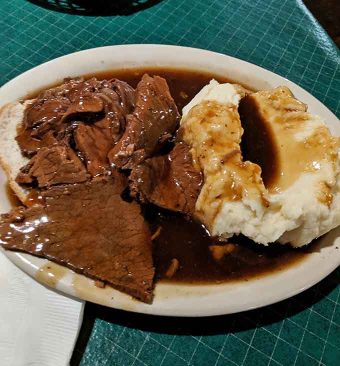 Tender roast beef swimming in gravy with mashed potatoes that prove Indiana knows exactly what comfort food means.