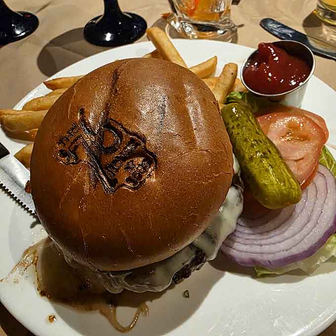 The '76 Burger arrives branded and beautiful, a beefy masterpiece that makes you grateful for modern culinary evolution.