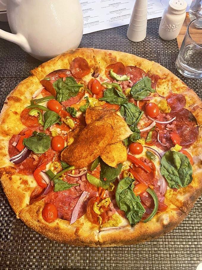 When your pizza arrives looking like edible art, you almost feel guilty cutting into it. Almost, but not quite.