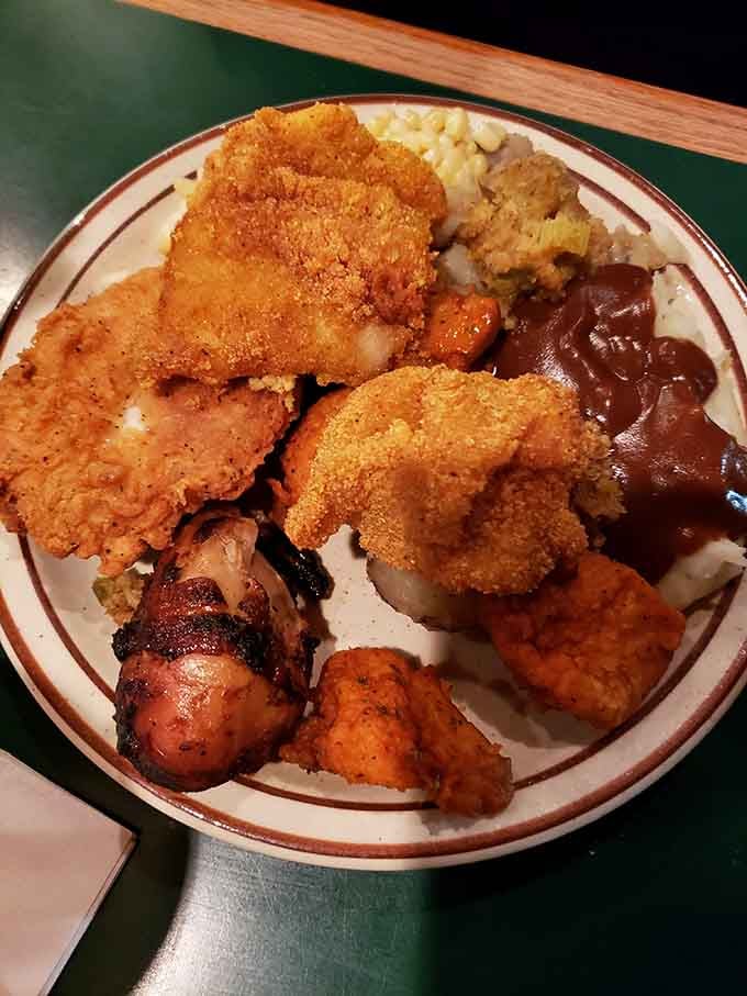 Golden fried fish and smoky barbecued chicken sharing one plate is like the best potluck you've ever attended.