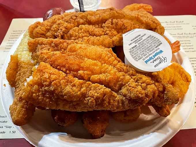Catfish fried to crispy perfection, proving that freshwater fish deserves just as much respect as ocean dwellers.