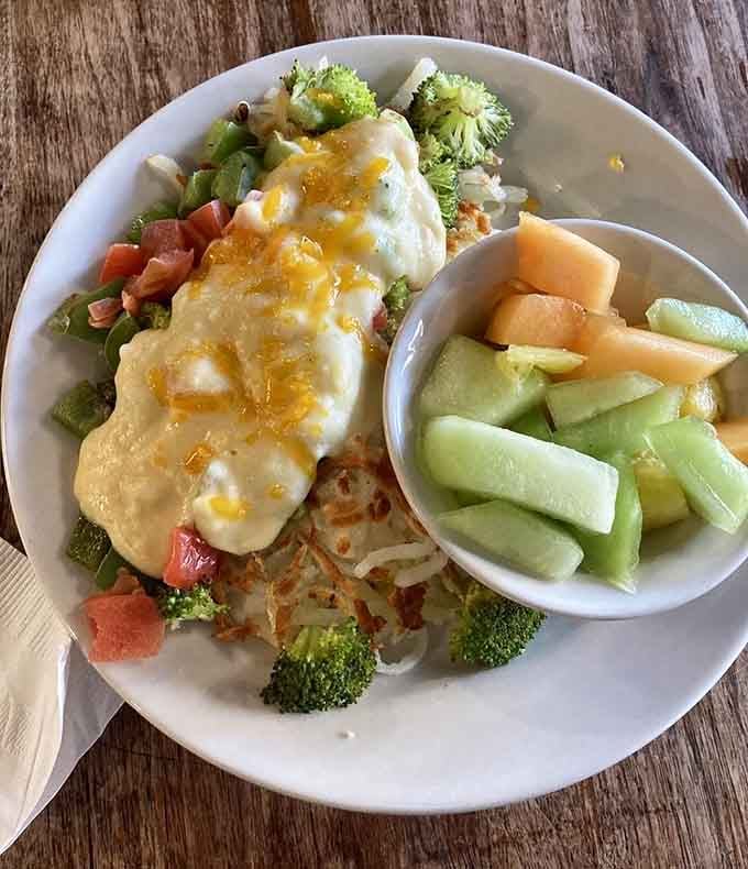 Hash browns meet perfectly cooked eggs in this hearty creation that understands what breakfast should be.