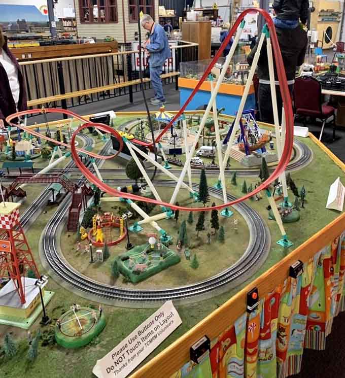 Yes, that's a miniature amusement park complete with working rides, because why should trains have all the fun?