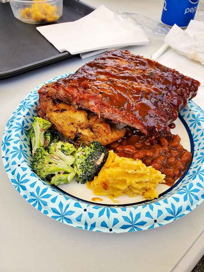 When your plate arrives looking like a barbecue fever dream, complete with broccoli for balance and beans for soul.