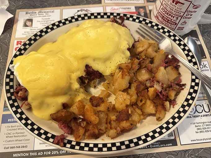 Irish Benedict draped in silky Hollandaise sauce proves corned beef hash belongs on every breakfast table in America.