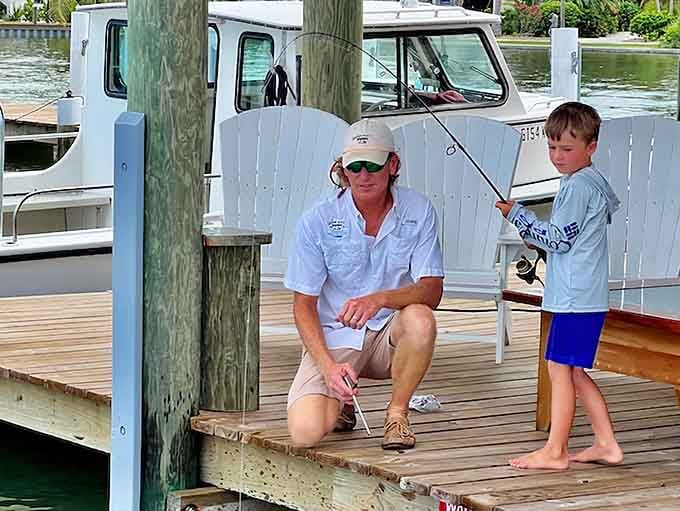 The dock welcomes anglers young and old, proving that patience and a fishing rod transcend generational differences beautifully here.