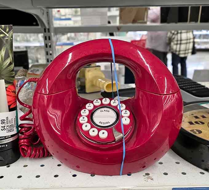 This retro red telephone is pure nostalgia, ready to add vintage charm to any room.