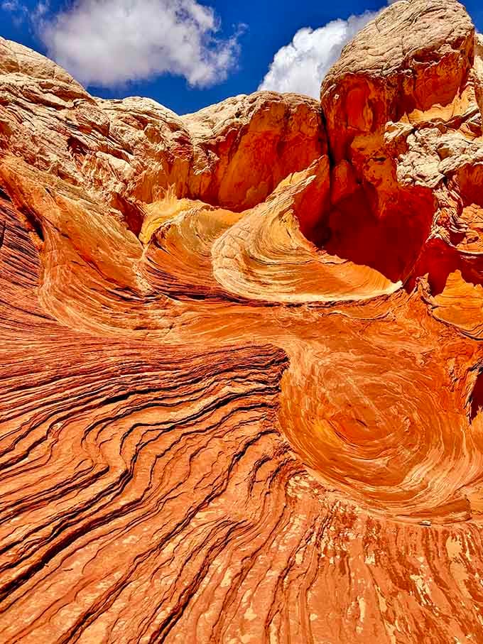 These layered formations stack up like the world's most impressive geological layer cake you'll ever witness.