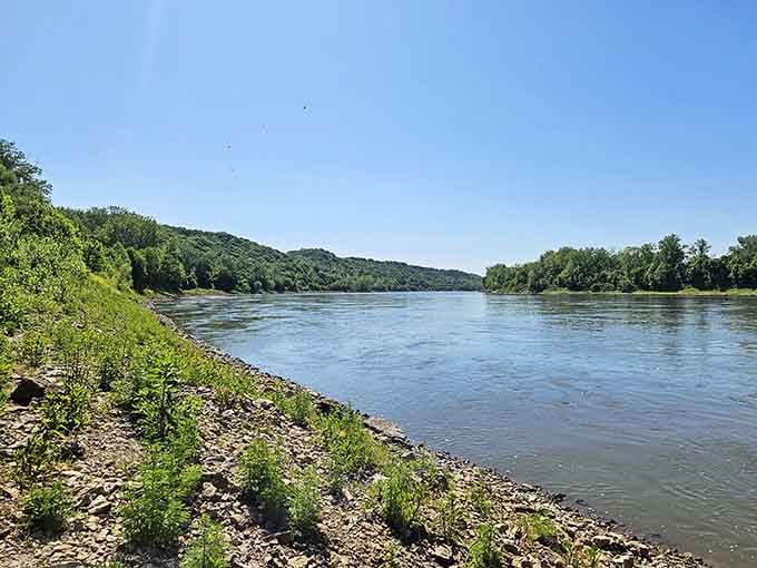 The Missouri River flows peacefully here, having learned its lesson about wandering off and leaving towns behind.