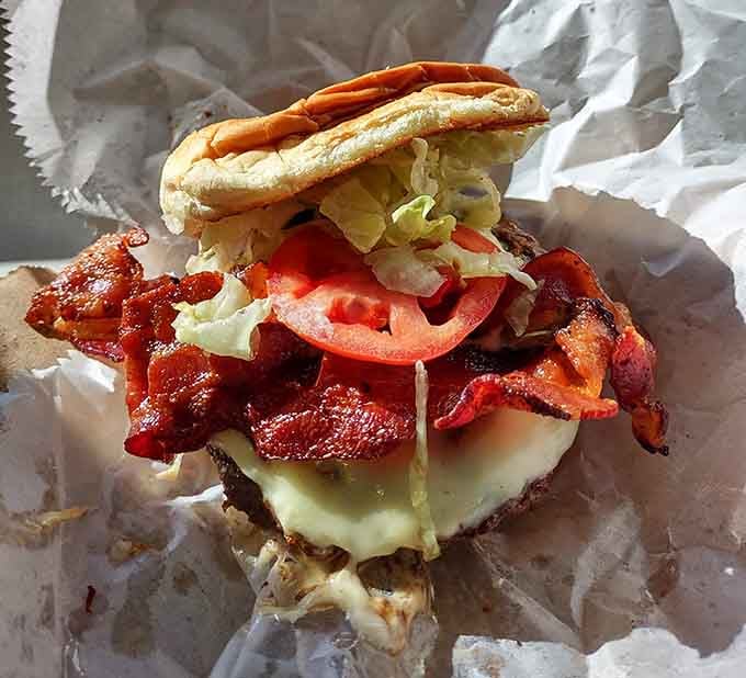 When bacon meets burger with cheese, lettuce, and tomato, magic happens between two buns every single time.