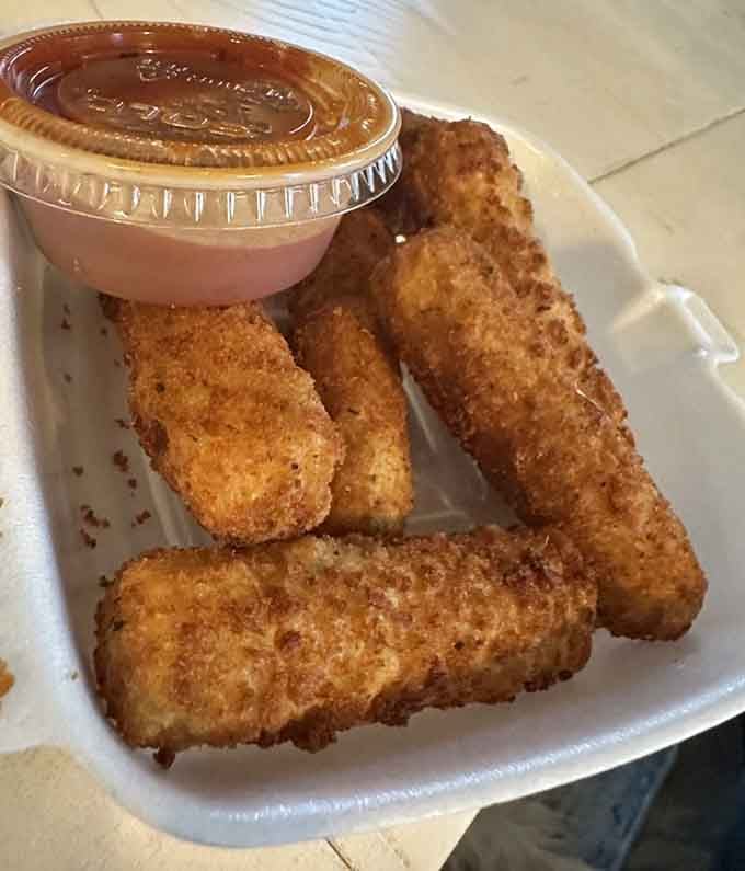 Mozzarella sticks with that perfect crunch factor, because who doesn't need a little fried cheese in their life?