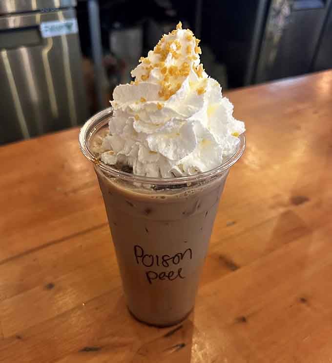 Poison Peel sounds dangerous, but that whipped cream mountain suggests the only risk is pure indulgence.