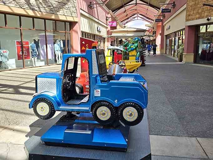 Even the kiddie rides know this is serious shopping territory, keeping little ones entertained between store visits.