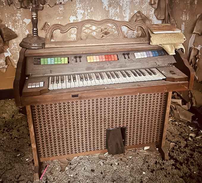 This old organ still stands ready to play, though the only music here now is the wind's eerie whistle.