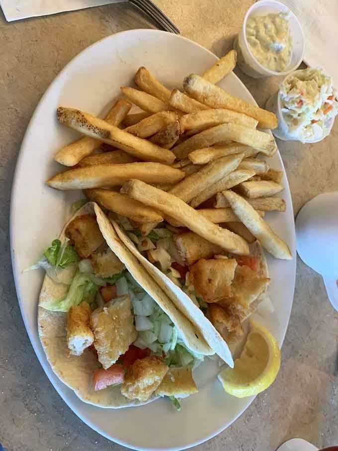 Fresh fish tacos loaded with crisp vegetables and creamy coleslaw make lunchtime feel like a celebration.