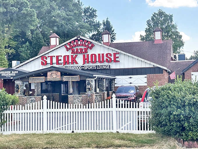 That classic barn-style roofline and bold red lettering have welcomed steak enthusiasts for generations of delicious memories.