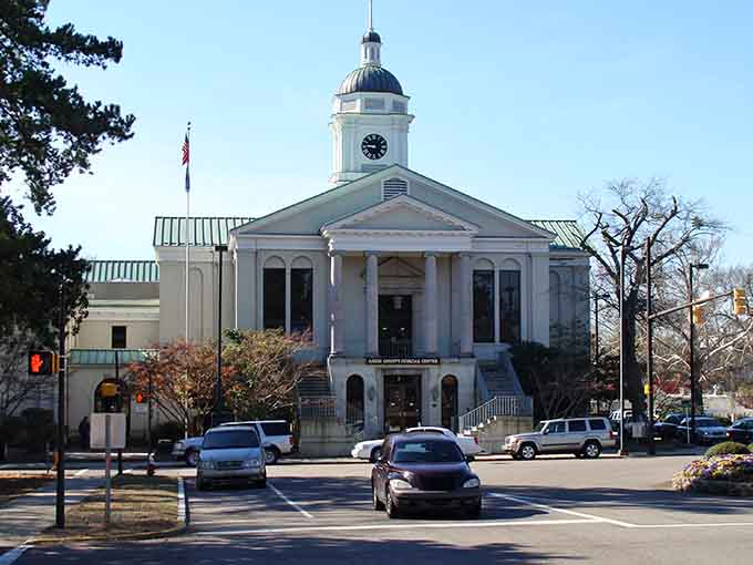 Aiken's courthouse commands attention like a grand dame at a garden party, elegant and impossible to ignore.