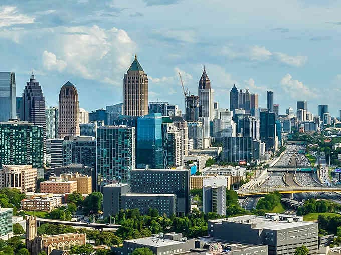 Atlanta's skyline rises like a modern monument, mixing glass towers with green spaces in a city that never stops growing.