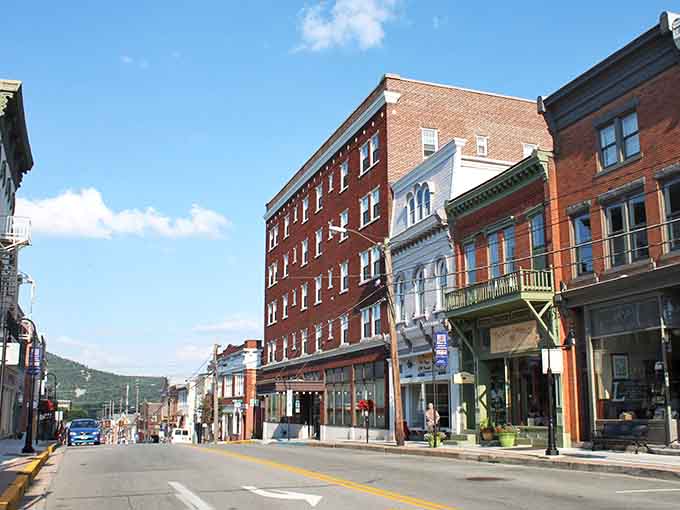 Multi-story brick buildings line up like proud soldiers who've been standing watch over Main Street for generations.