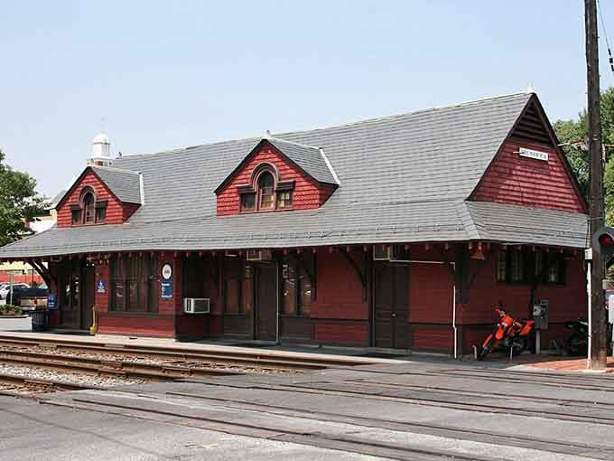 This vintage train station's red shingles have welcomed travelers for generations, still standing proud and beautiful.