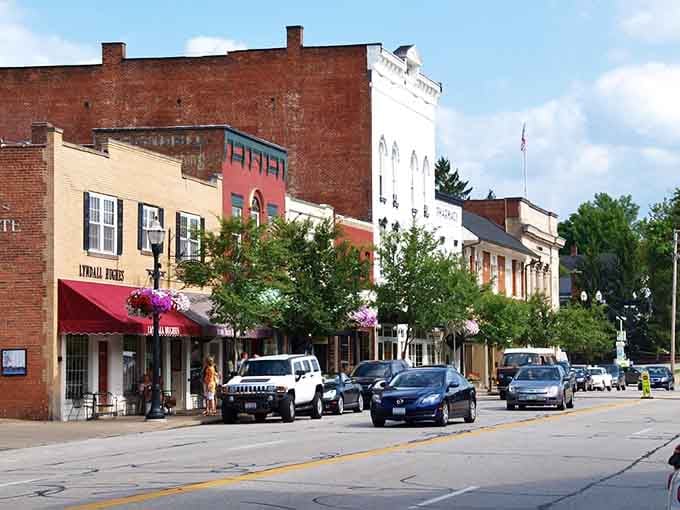 Historic buildings wear their age proudly along this main street where local shops outnumber chain stores by a comfortable margin.