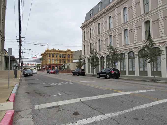 Those ornate balconies and weathered facades tell stories of cotton traders and riverboat captains from long ago.