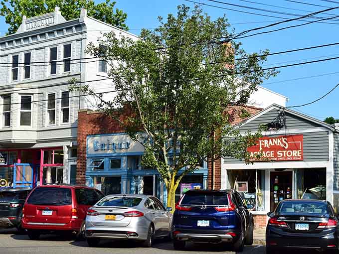 Frank's Package Store anchors this delightfully eclectic block where every building tells its own colorful story of survival.