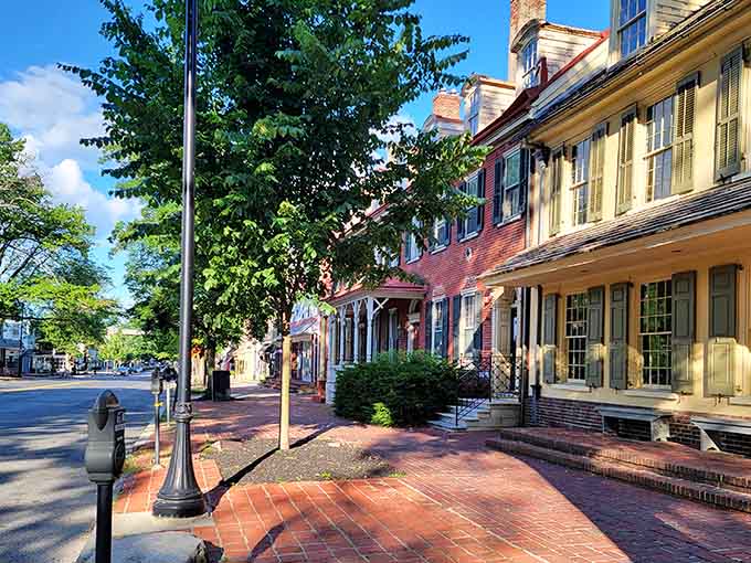 Brick sidewalks and classic storefronts line this peaceful street where shopping feels like a step back in time.
