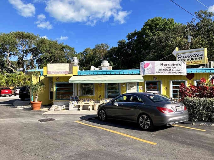 Bright turquoise and sunny yellow paint make this little restaurant pop like a tropical postcard come to life perfectly.
