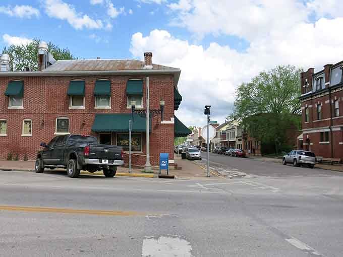 This main drag stretches toward distant bluffs, each building a testament to river commerce and frontier determination that built America.