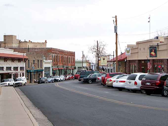 Jerome's main street looks like it defied gravity and won, clinging to this hillside with pure determination.