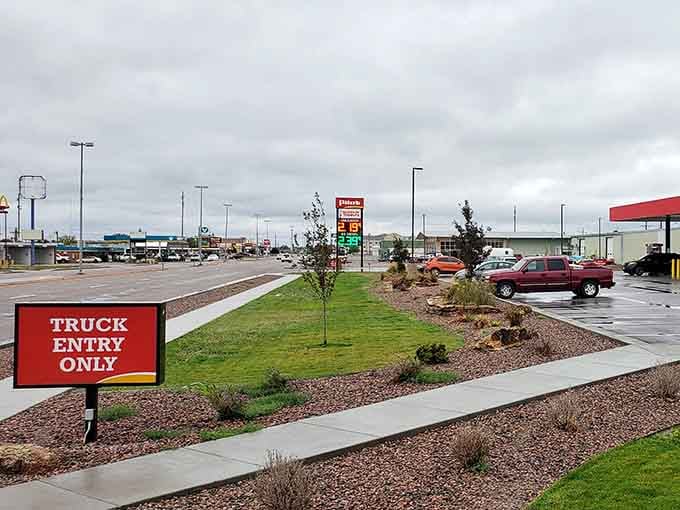 The wide-open plains stretch beyond this commercial area, reminding you there's still plenty of elbow room in Colorado.