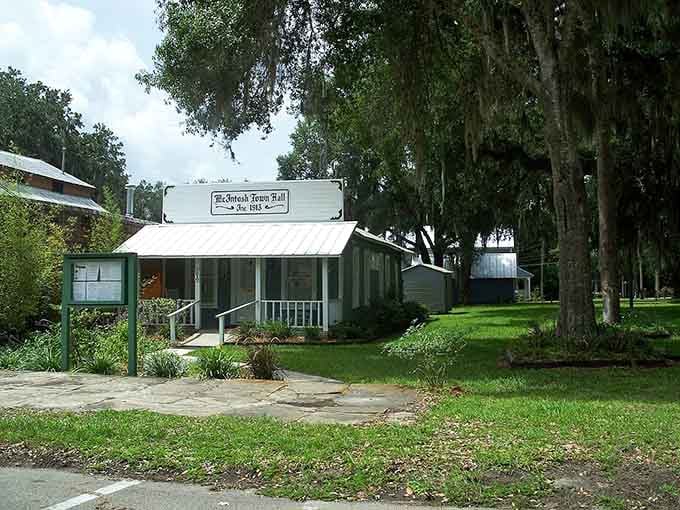 Moss-draped oaks shelter this historic hall where community gatherings have happened since folks traveled by horse and buggy.