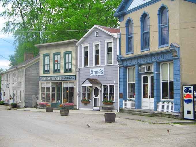 Charming wooden buildings painted in soft pastels make you feel like you've wandered onto a movie set.