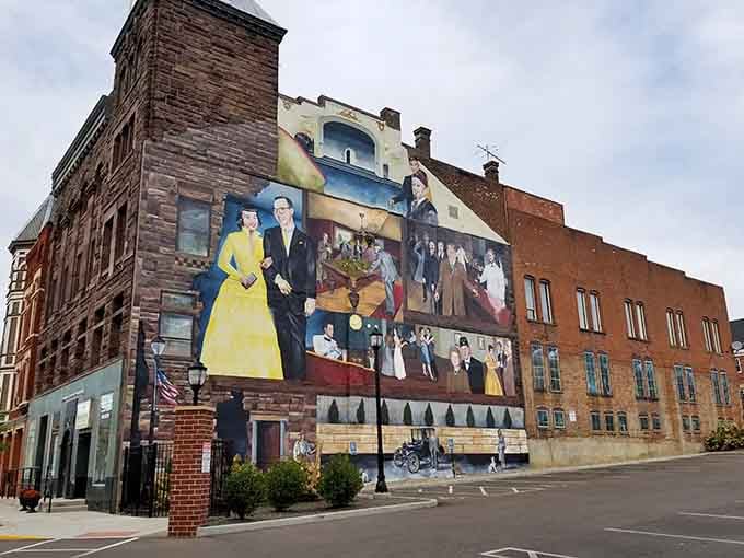 This stunning mural transforms an ordinary wall into a vibrant celebration of community heritage and pride.