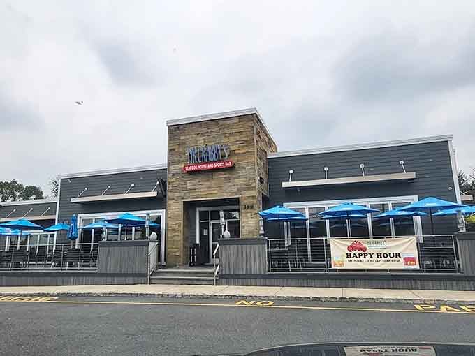 Modern stone facade and bright blue umbrellas welcome you to inland seafood excellence that defies all geographical expectations.
