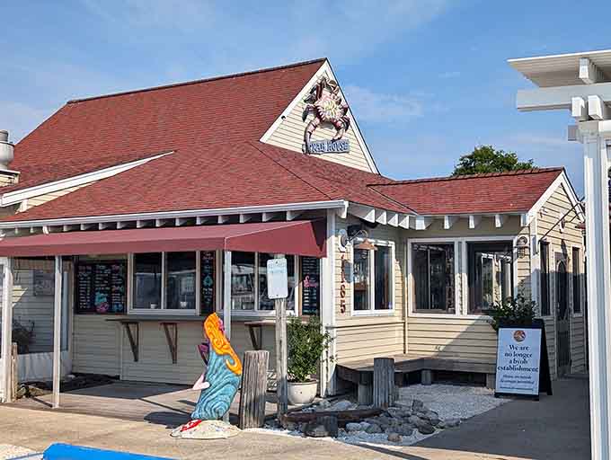 That cheerful red roof welcomes you to a whimsical waterfront spot where fun meets fantastic seafood.