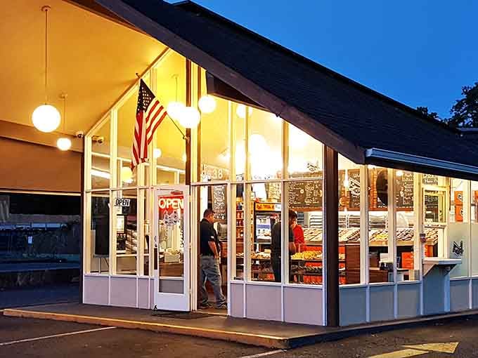 Those glowing globe lights create an inviting atmosphere that says "welcome home" to anyone craving classic American donuts.