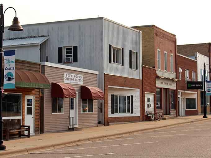 Mixed facades tell stories of different eras coexisting peacefully on one charming small-town street.