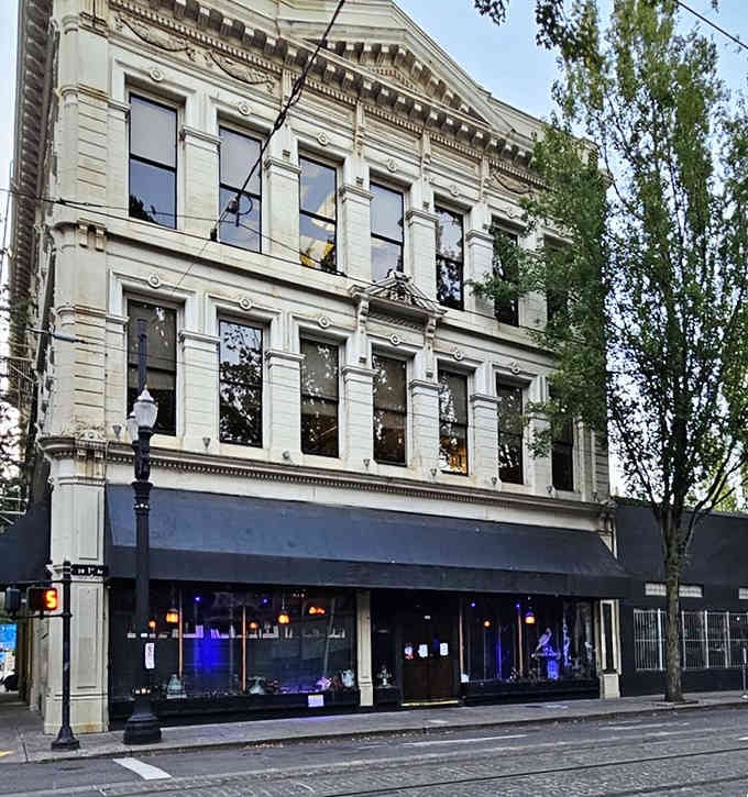 Gothic architecture meets moody evening lighting in this historic building that could host the Addams Family for dinner.