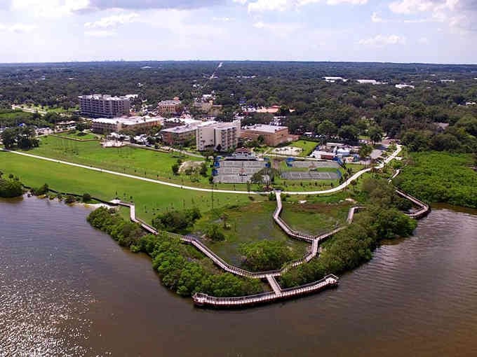 Green spaces hug the waterfront in this aerial view, proving that smart planning creates communities where nature and neighborhoods coexist beautifully.