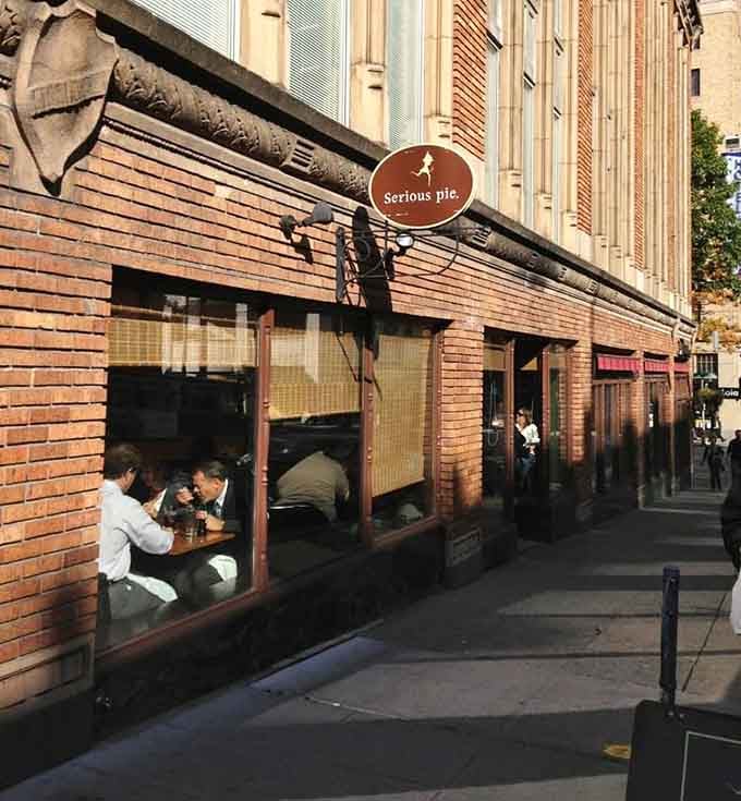 Urban brick meets downtown energy at this pizza pie destination where serious flavor happens in a stone oven.