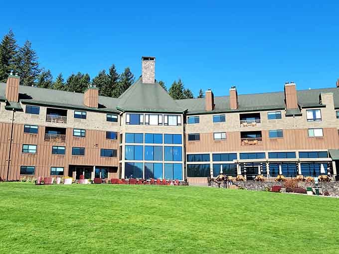 Manicured lawns stretch toward forest edges at this Columbia Gorge gem, blending refined comfort with wild natural beauty.
