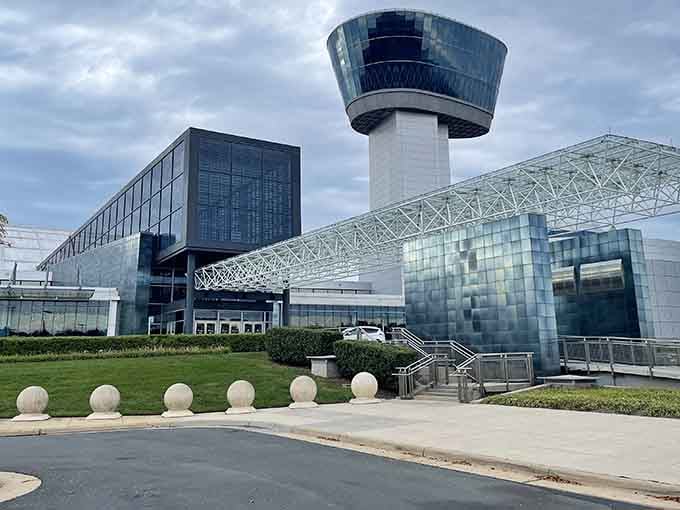 That futuristic control tower stands like something from The Jetsons, guarding hangars full of aviation history you can explore.