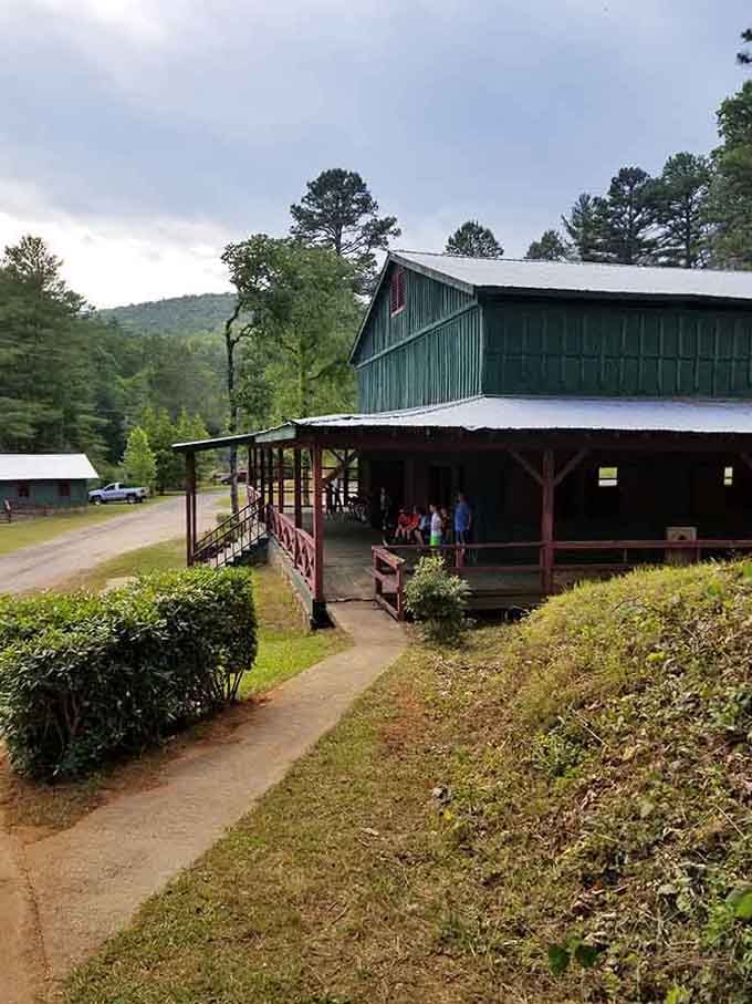 This covered pavilion nestled in the pines is where community gatherings feel like family reunions with better food.
